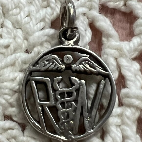 Jewelry | Sterling Silver Rn Charm | Poshmark